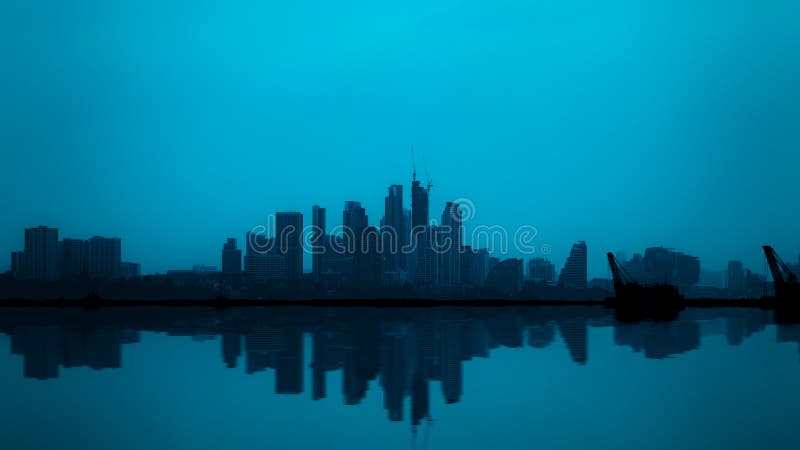 Composite Image of Waterfront City Skyline with Blue Tone Panoramic ...