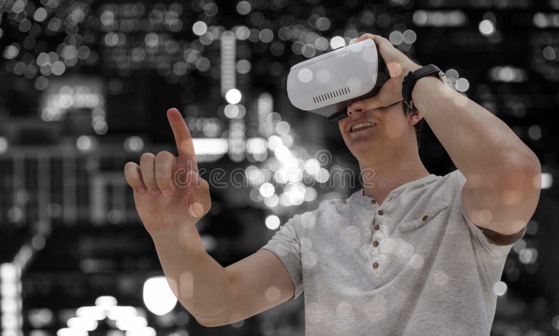 Composite Image of Young Man Using Virtual Reality Glasses Stock Photo ...