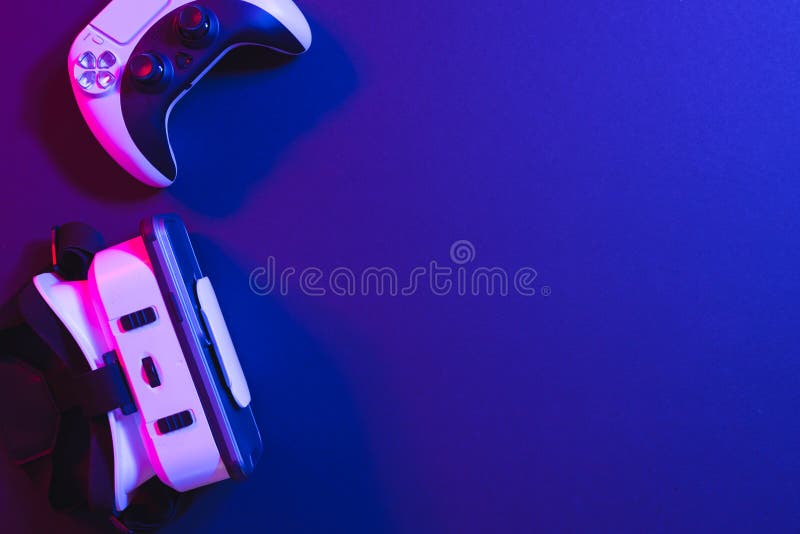 Composite of Video Game Pad and Vr Headset with Copy Space on Neon ...