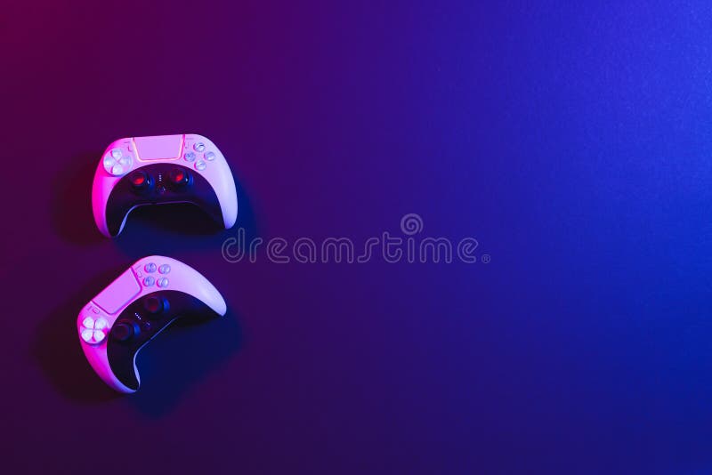 Composite of Video Game Pads and Copy Space on Neon Background Stock ...