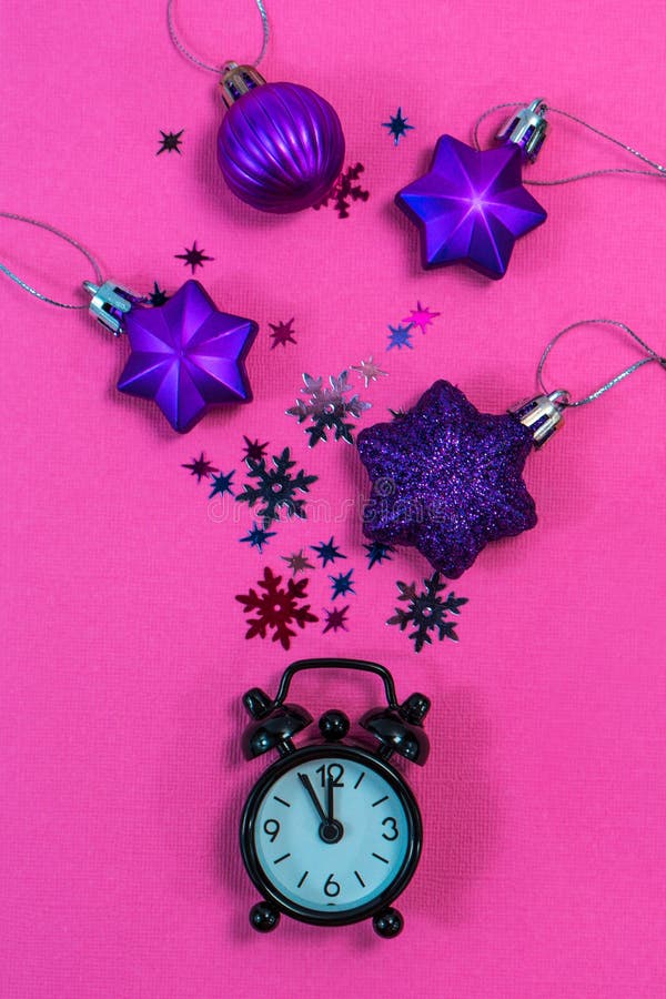 A Composition with an Alarm Clock and Stars, Snowflakes, Gifts. Stylish ... A Composition with an Alarm Clock and Stars, Snowflakes, Gifts. Stylish ...