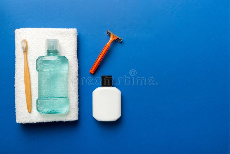 Composition with Bath Cosmetics on Table. Razor, Toothpaste, Soap, Gel ...