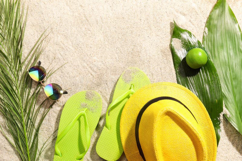 Composition with Beach Accessories and Palm Leaf on Sand Stock Image ...