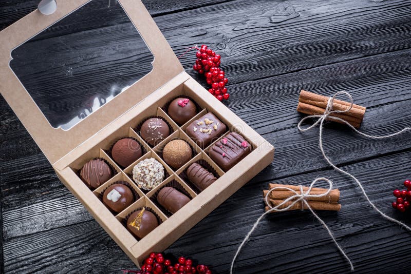 Composition on a Black Wooden Background from Handmade Sweets Stock ...
