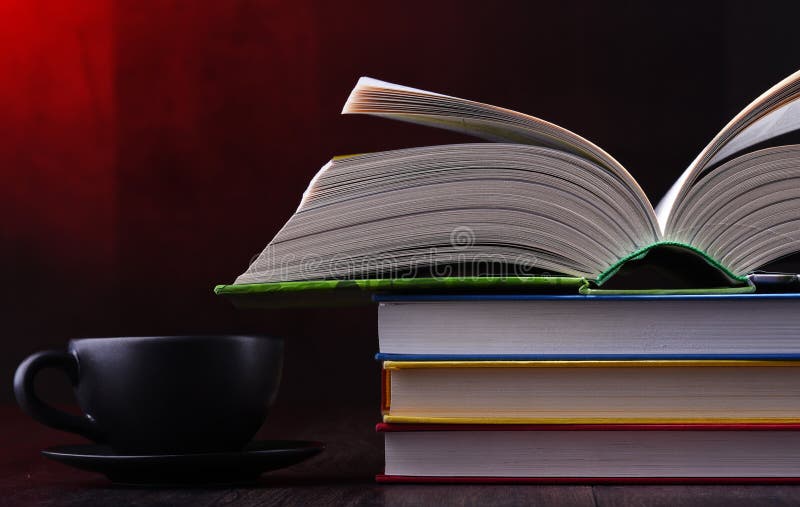 Composition with Books and Cup of Coffee on the Table Stock Photo ...