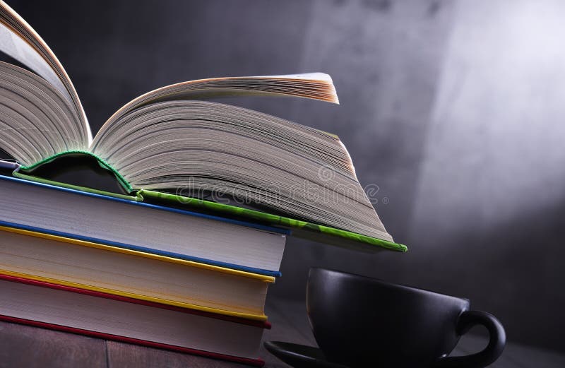 Composition with Books and Cup of Coffee on the Table Stock Photo ...