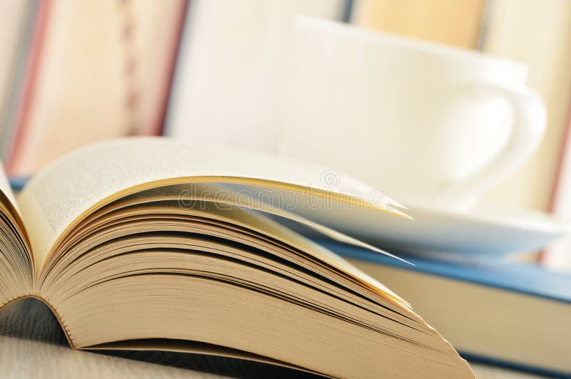 Composition with Books and Cup of Coffee on the Table Stock Image ...