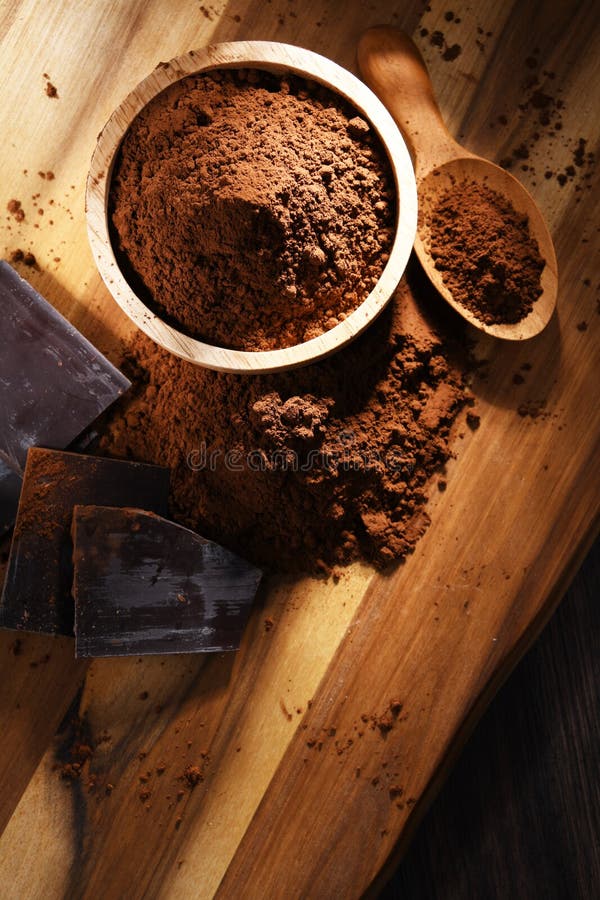 Composition with Bowl of Cocoa Powder on Wooden Table Stock Photo ...
