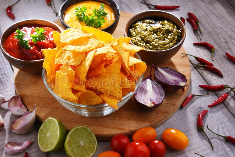 Composition with Bowl of Potato Chips Stock Image - Image of salsa ...