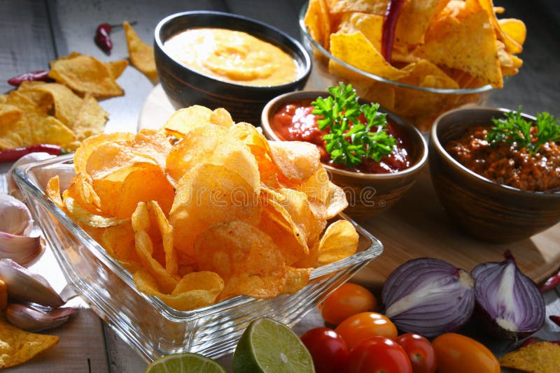 Composition with Bowl of Potato Chips Stock Image - Image of salted ...