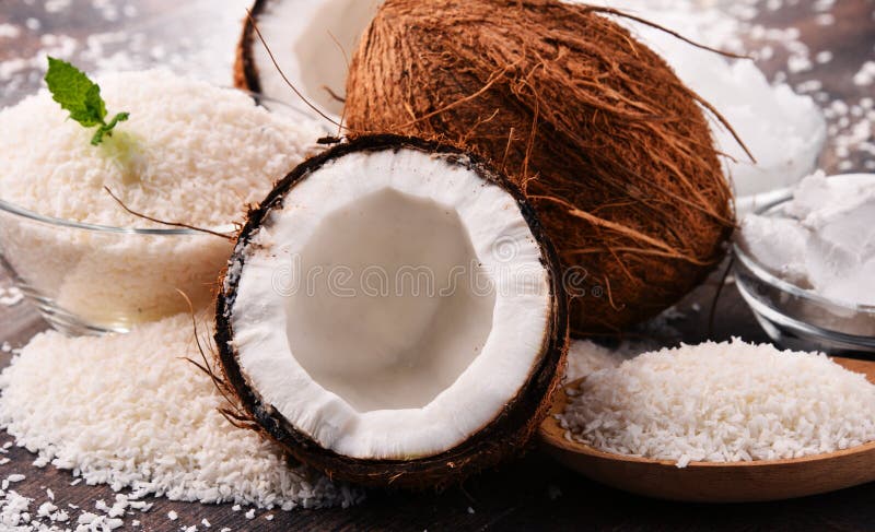 Composition with Bowl of Shredded Coconut and Shells Stock Photo ...