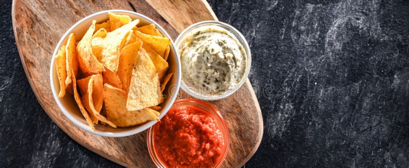 Composition with a Bowl of Tortilla Chips and Dipping Sauces Stock ...