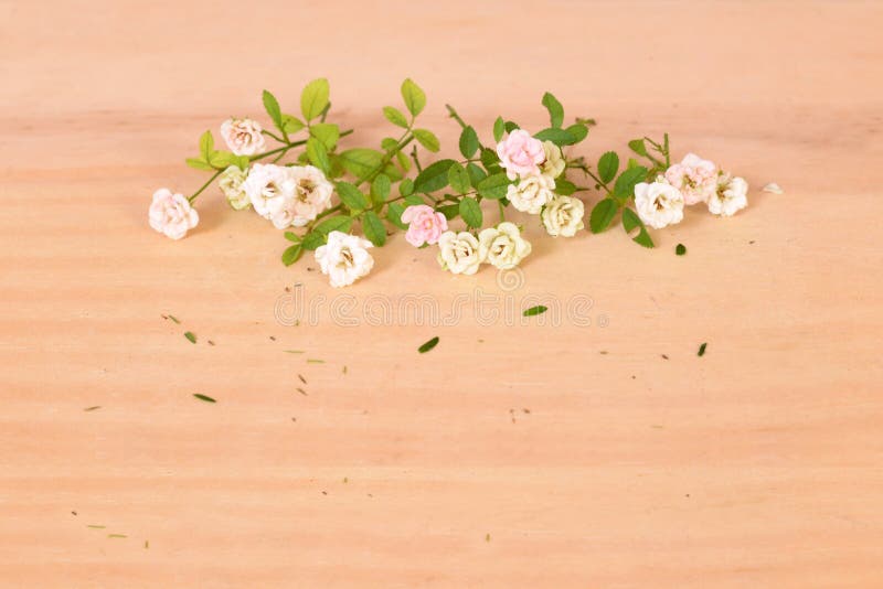 Composition of a Bunch of Small Roses on a Wooden Table Stock Image ...