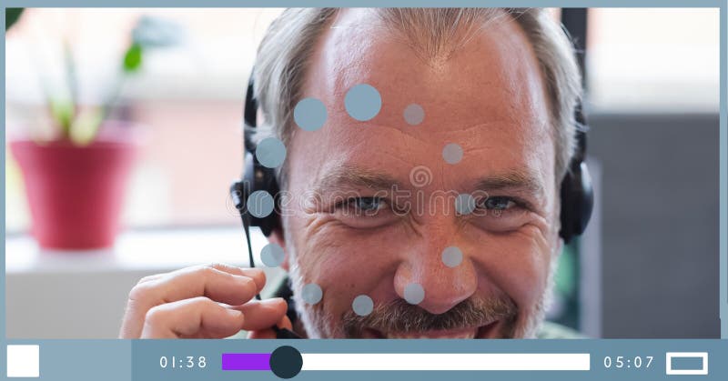 Composition of Businessman Talking on Headset on Video Playback ...