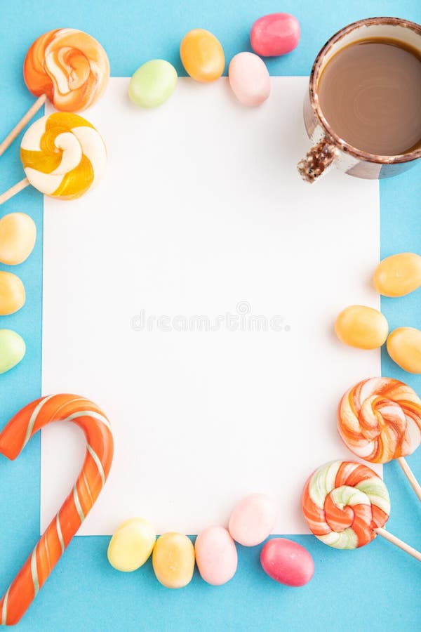 Composition with Candies Frame on Blue Pastel Background. Copy Space ...