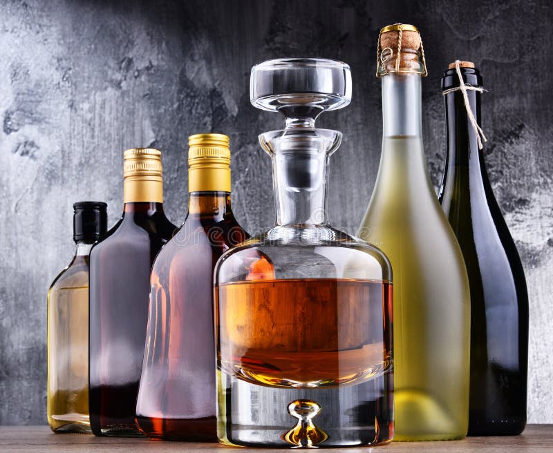 Carafe and Bottles of Assorted Alcoholic Beverages Stock Photo - Image ...