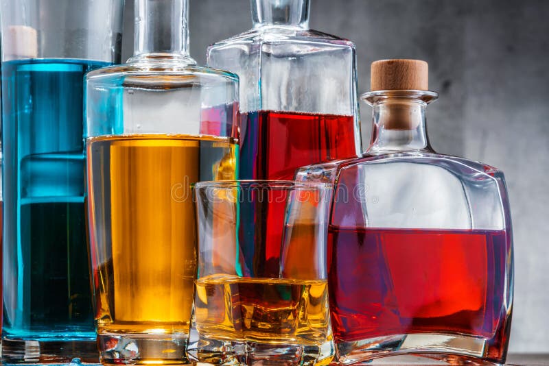 Carafe and Bottles of Assorted Alcoholic Beverages Stock Photo - Image ...