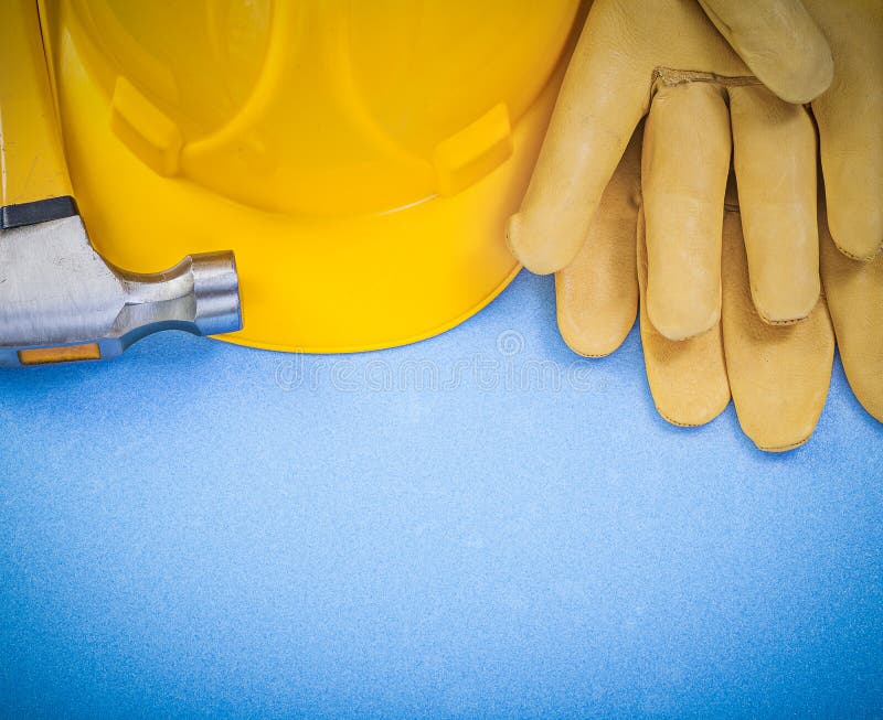 Composition of Claw Hammer Safety Gloves Building Helmet on Blue Stock ...