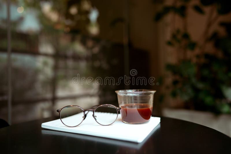 Composition of Coffee Cup with Book and Glasses Stock Image - Image of ...