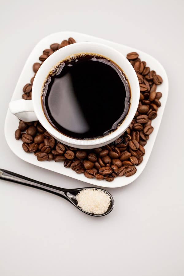 Composition with Coffee Cup, Coffee Powder, Sugar and Beans Stock Photo ...