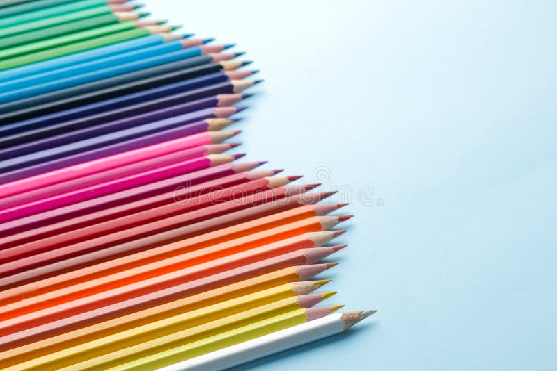 Composition with Colored Pencils on a Bright Blue Background. Close-up ...