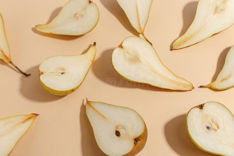 Composition of Cut Pears on a Beige Background. Top View Stock Image ...
