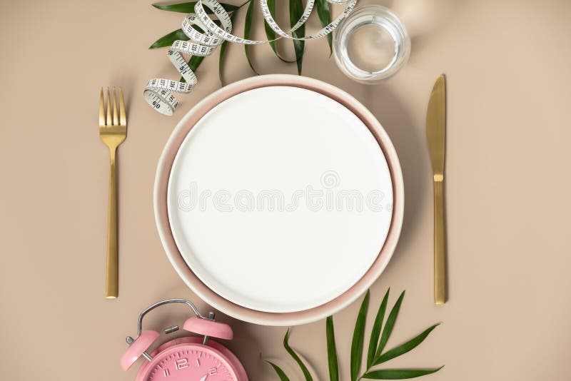 Composition with Cutlery, Empty Plate, Measuring Tape and Alarm Clock ... Composition with Cutlery, Empty Plate, Measuring Tape and Alarm Clock ...