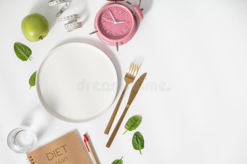 Composition with Cutlery, Empty Plate, Measuring Tape, Diet Plan, Apple ... Composition with Cutlery, Empty Plate, Measuring Tape, Diet Plan, Apple ...