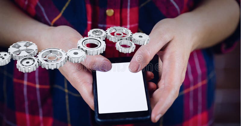 Composition of 3d Cogs Over Midsection of Woman Using Smartphone with ...