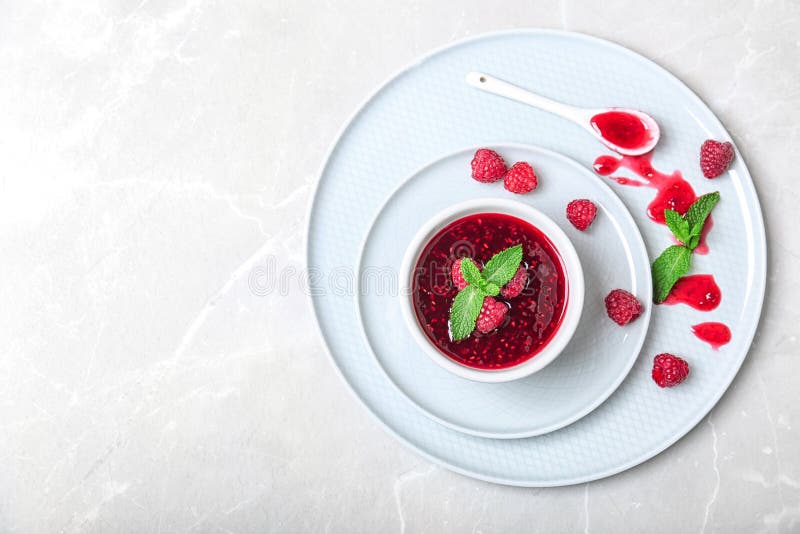 Composition with Delicious Raspberry Jam on Plates Stock Image - Image ...