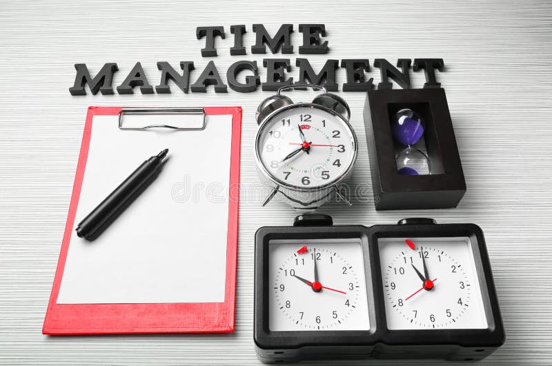 Composition with Different Clocks, Clipboard and Phrase "Time ...