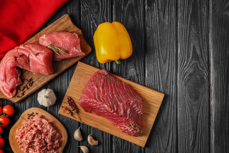 Composition with Different Sorts of Fresh Meat on Dark Background Stock ...