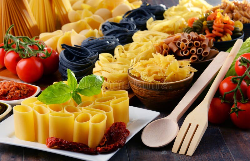 Composition with Different Sorts of Pasta on Kitchen Table Stock Photo ...