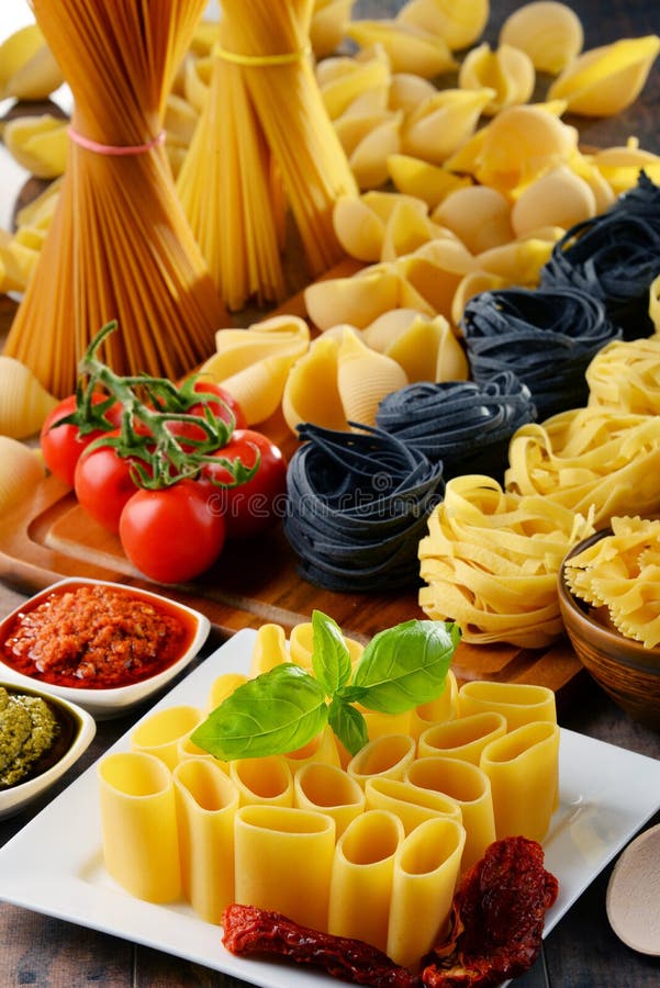 Composition with Different Sorts of Pasta on Kitchen Table Stock Photo ...