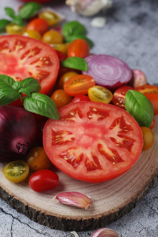 Composition of Different Tomatoes, Onion, Basil and Garlic Stock Image ...