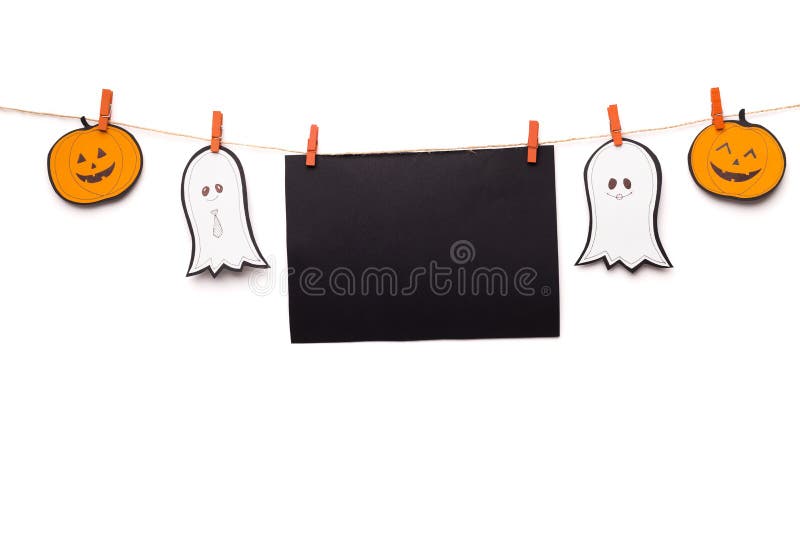 Composition of Drying on Rope Halloween Ghosts and Pumpkins Stock Image ...