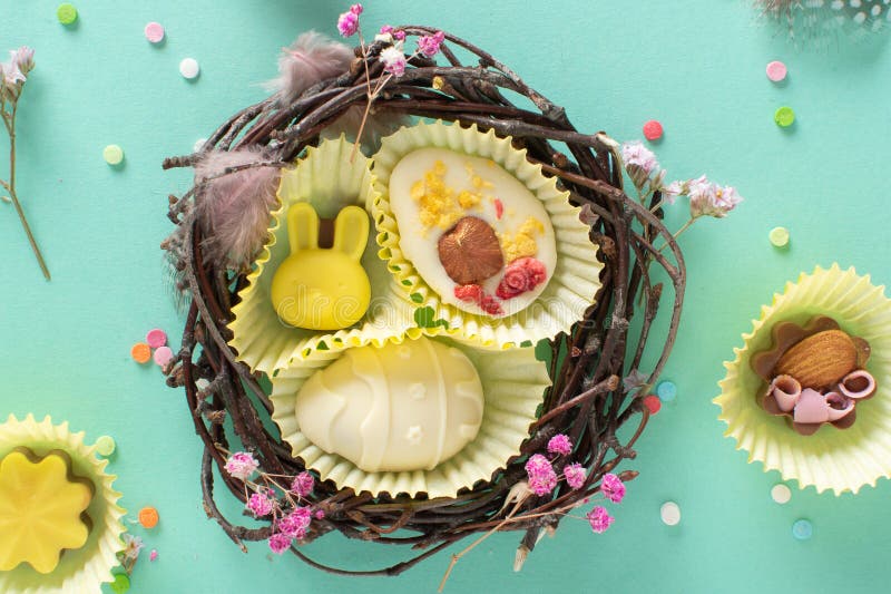 A Composition with an Eco-nest and Chocolate Eggs in the Form of Easter ...