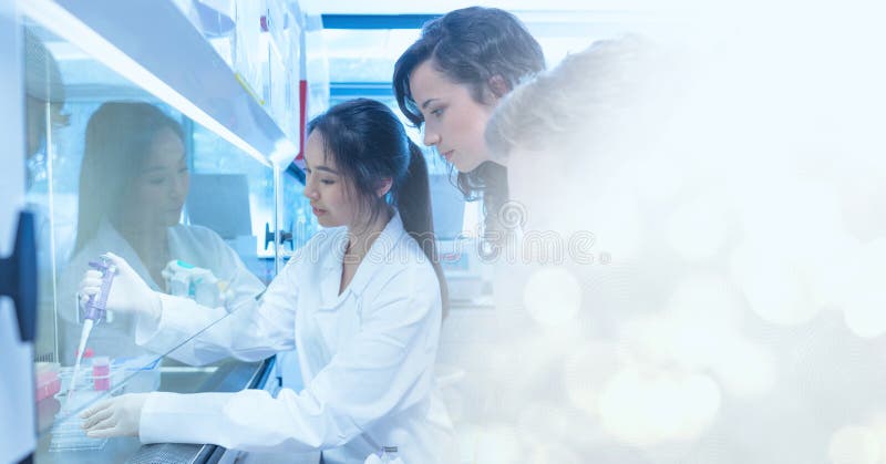 Composition of Female Lab Technicians at Work, with White Bokeh Copy Space To Right Stock Image ...