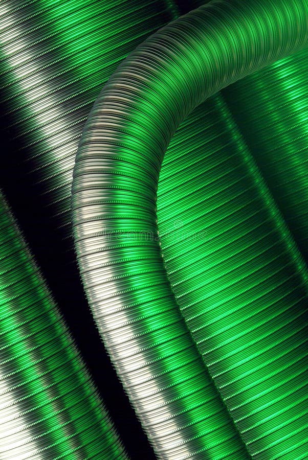 Composition of Flexible Steel Pipes with Green Reflections Stock Image ...