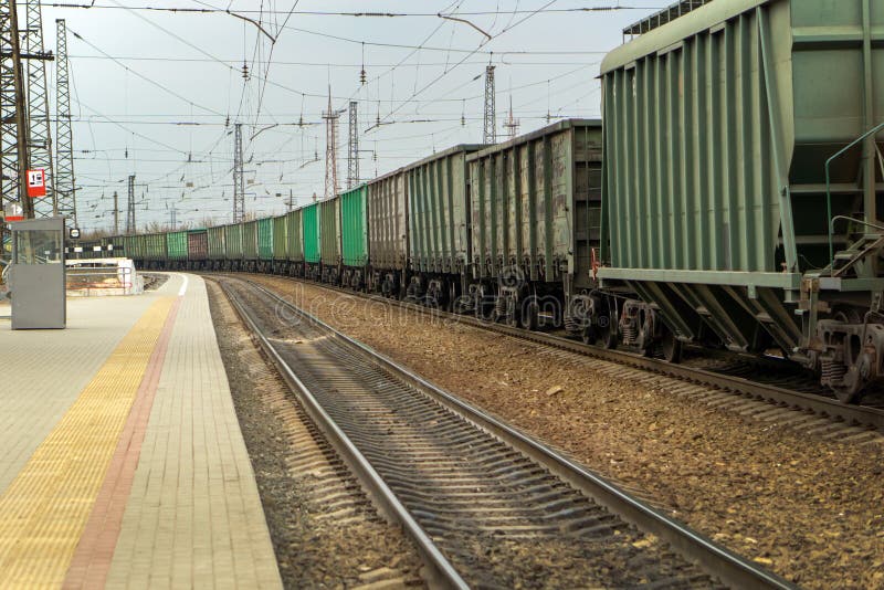 Freight Train Standing Next To the Platform Stock Photo - Image of ...