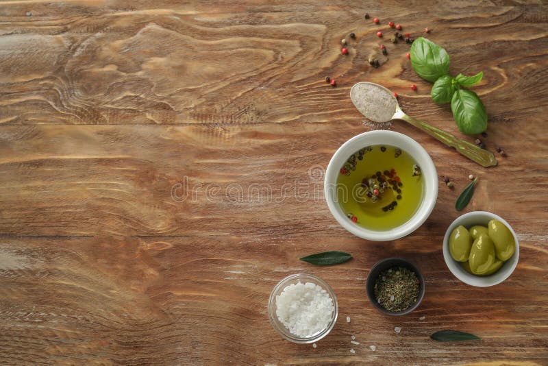 Composition with Fresh Olive Oil on Wooden Table Stock Photo - Image of ...