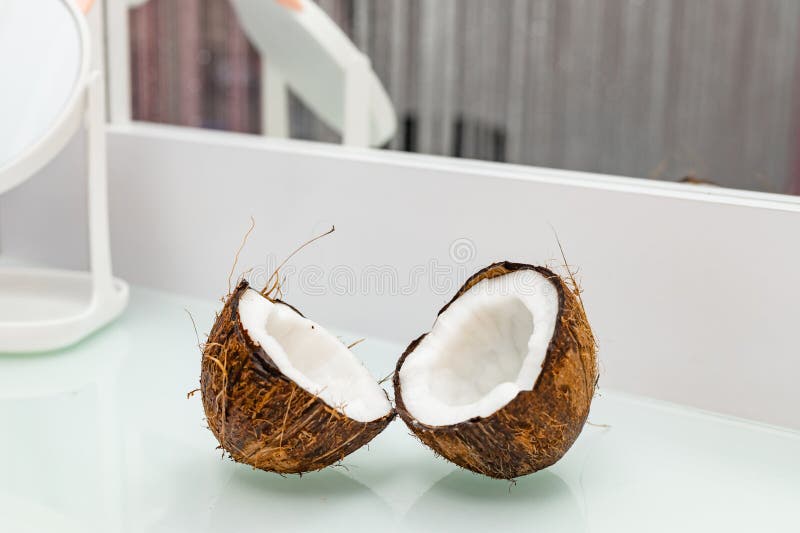 Composition of Fresh Open Coconut on the Table Near the Mirror Stock ...