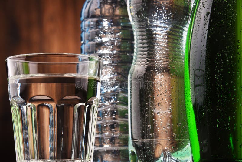 Composition with Glass and Bottles of Mineral Water Stock Photo - Image ...