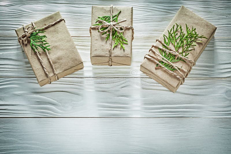 Composition of Handmade Gift Boxes with Green Branches on Wooden Stock ...