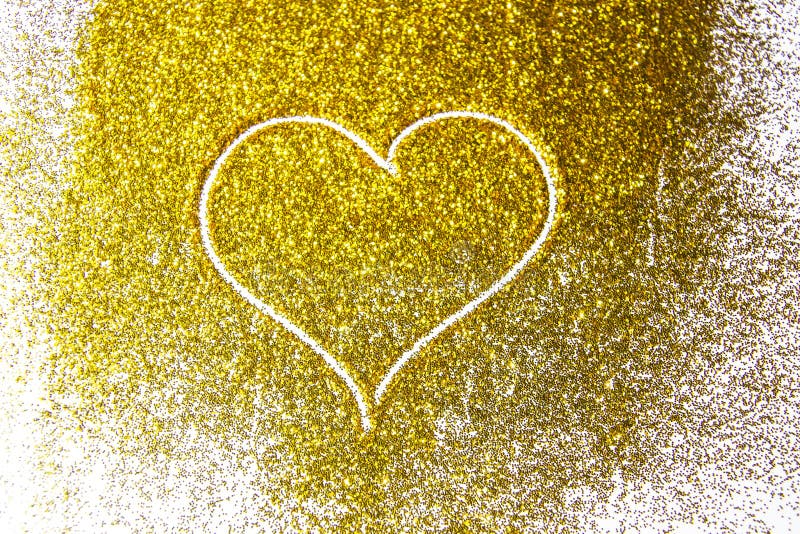 A Composition with a Heart on Beautiful Gold Glitter. Background and ...