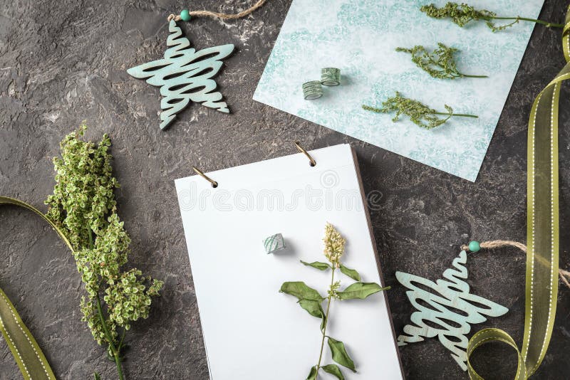 Composition with Items for Scrapbooking and Green Plants on Grey ...