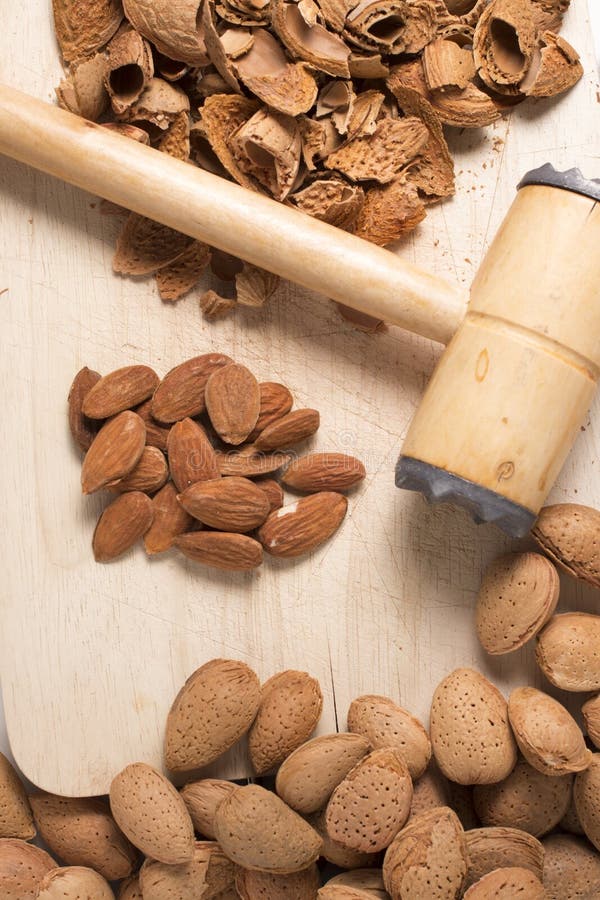 Sweet almonds with hammer stock photo. Image of tasty - 105952406