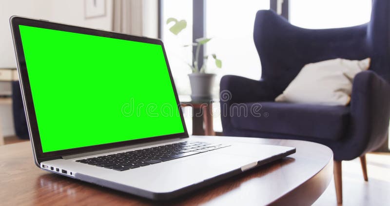 Composition of Laptop with Green Screen on Table at Home Stock Video ...