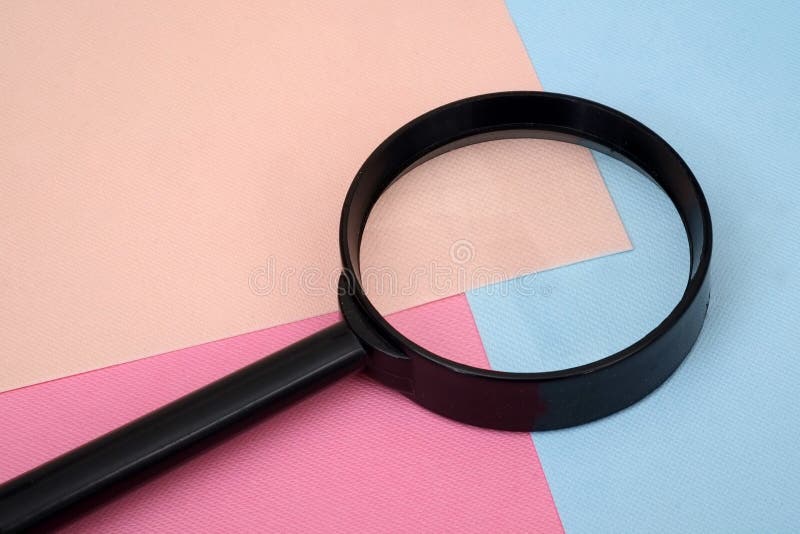 Magnifier on Colored Paper. Top View. Search Concept Stock Image ...