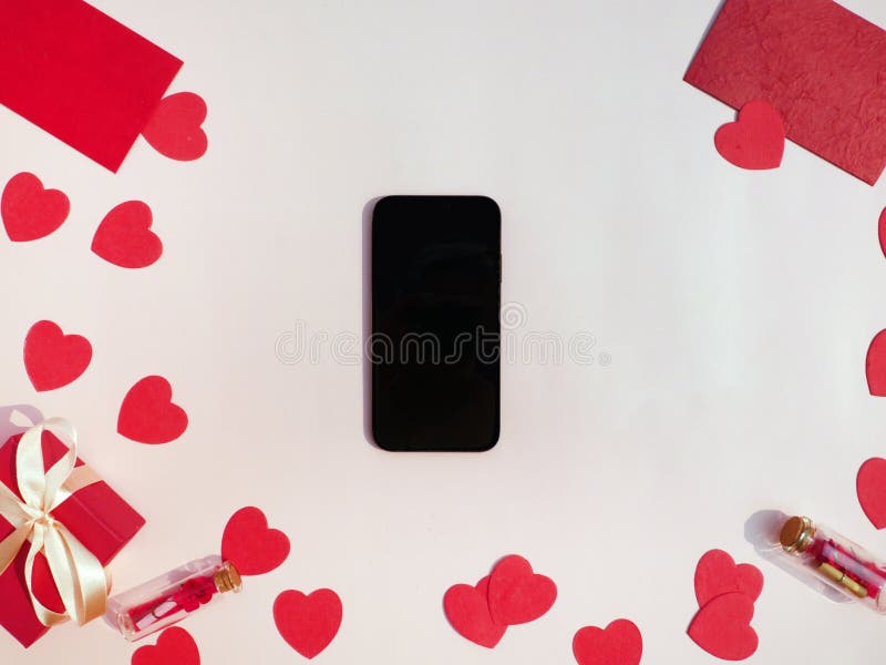 Composition with Mobile Phone in the Middle, Gifts and Red Hearts on ...